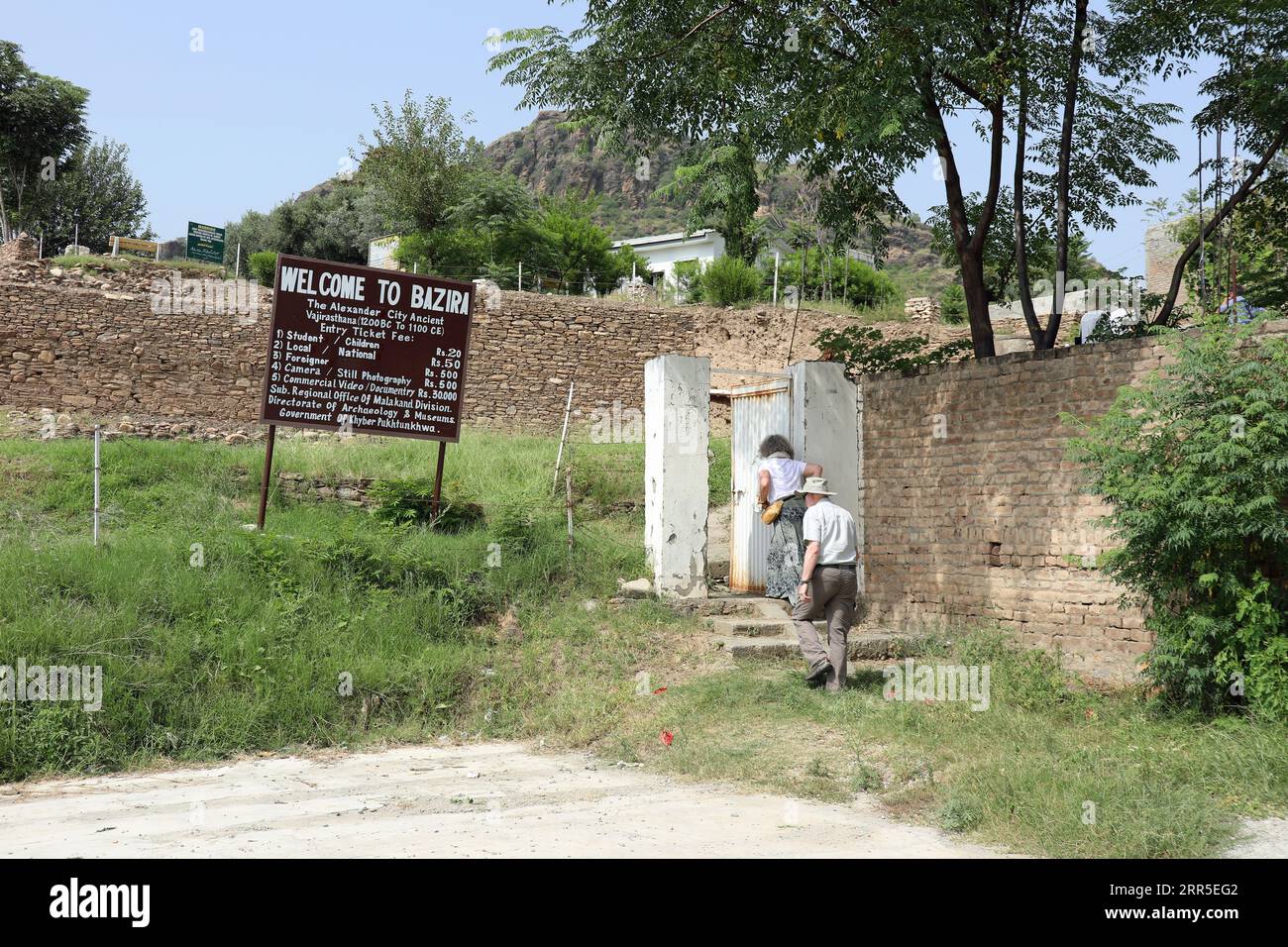 Tourists entering the ancient city of Bazira in Pakistan Stock Photo ...