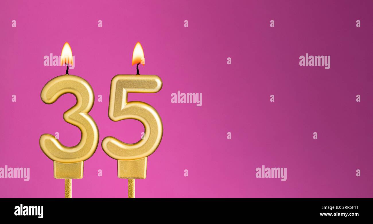 Candle number 35 in purple background - birthday card Stock Photo - Alamy