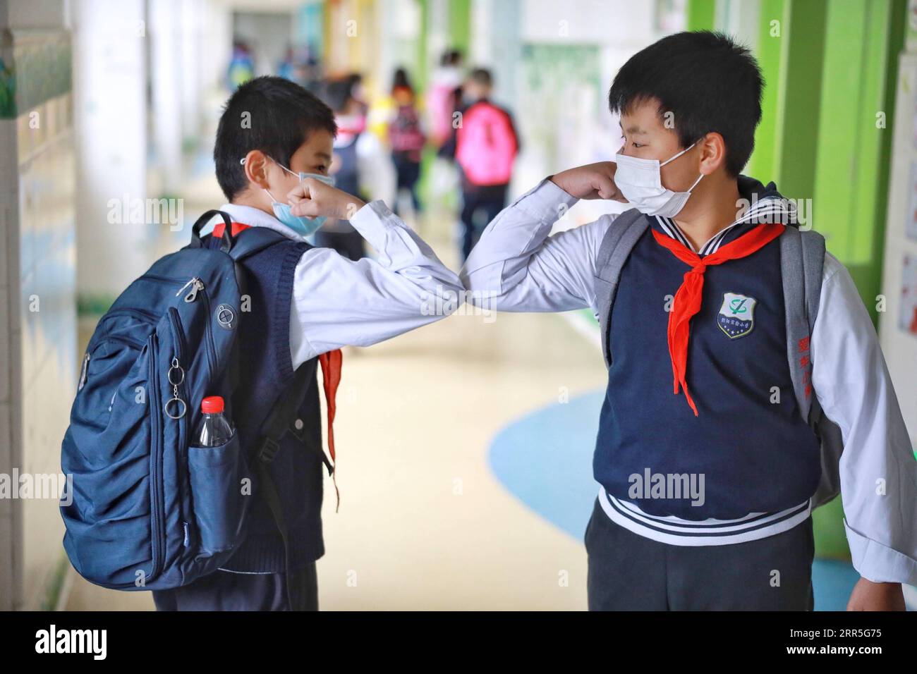 Students greet each other hi-res stock photography and images - Alamy