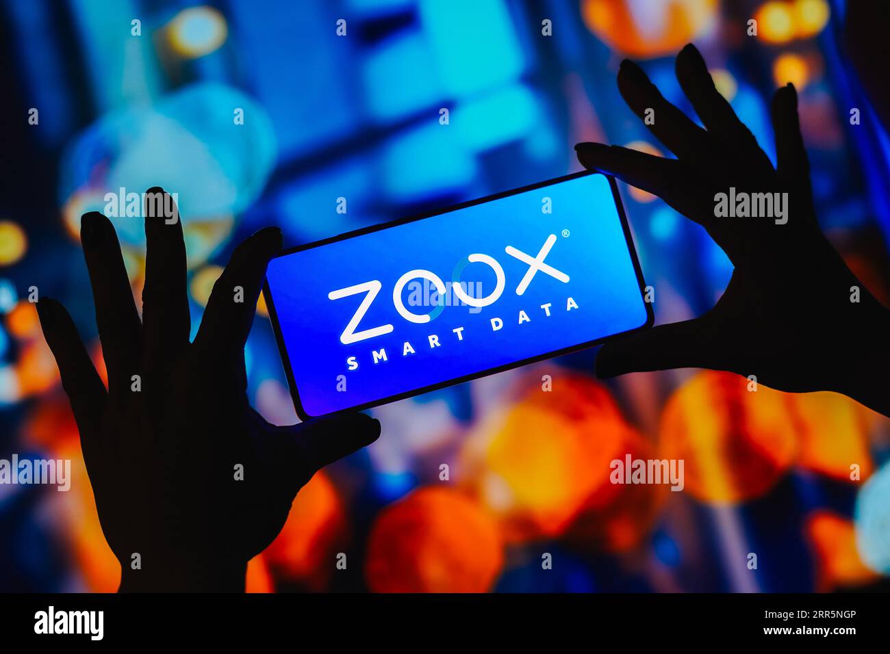 In this photo illustration, the Zoox Smart Data logo is displayed on a ...
