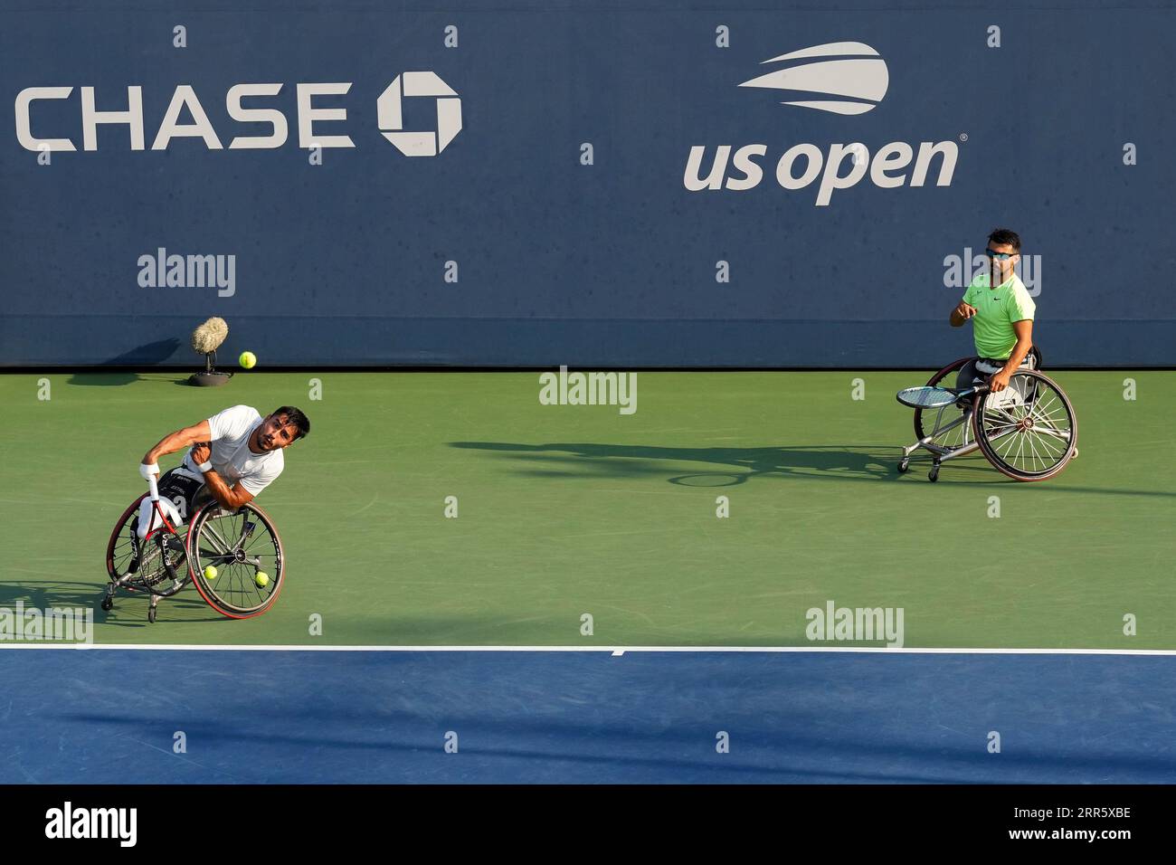 Ahmet Kaplan and Ugur Altinel in action during a wheelchair quad ...