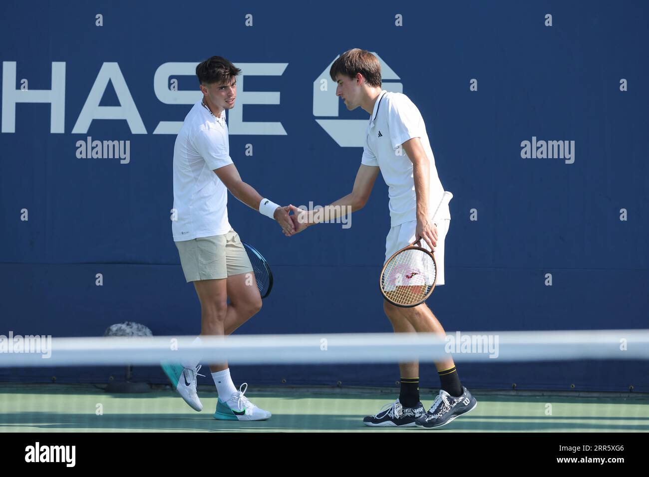 Branko Djuric and Arthur Gea in action during a junior boys' doubles ...