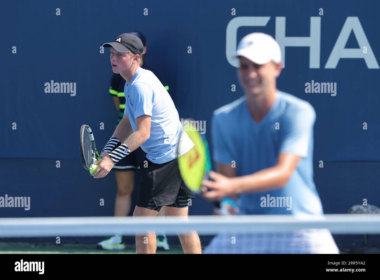 Cooper Woestendick and Maxwell Exsted in action during a junior boys ...