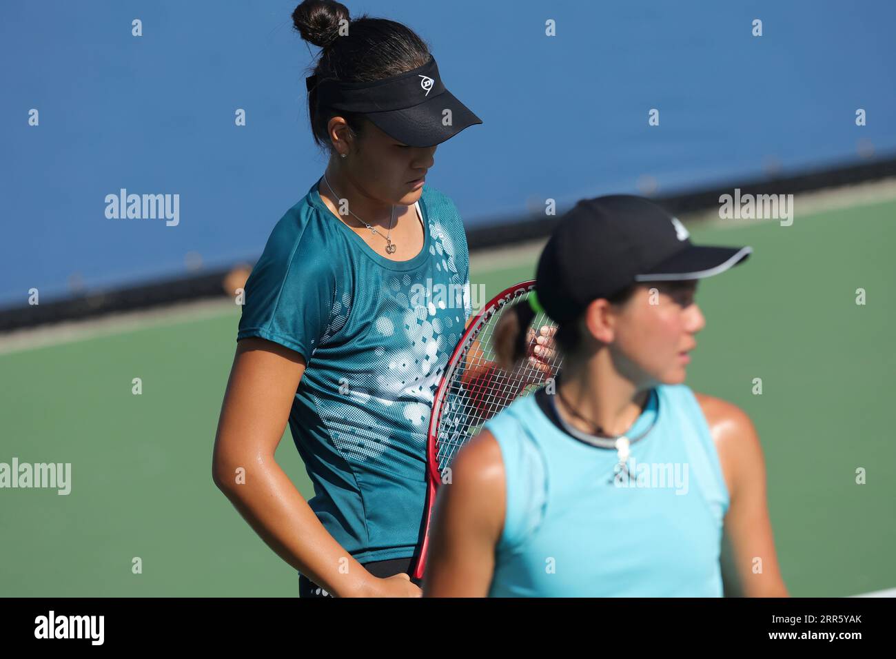 Ena Koike and Sayaka Ishii in action during a junior girls' doubles ...