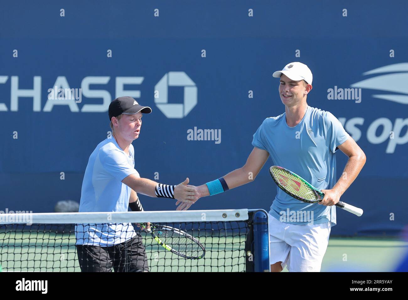 Cooper Woestendick and Maxwell Exsted in action during a junior boys ...