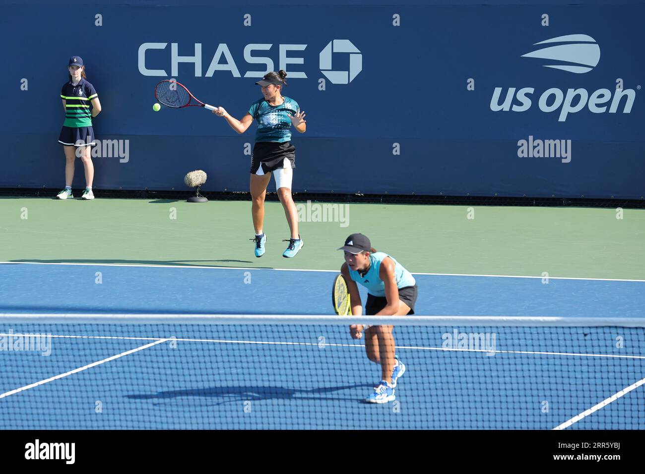 Ena Koike and Sayaka Ishii in action during a junior girls' doubles ...