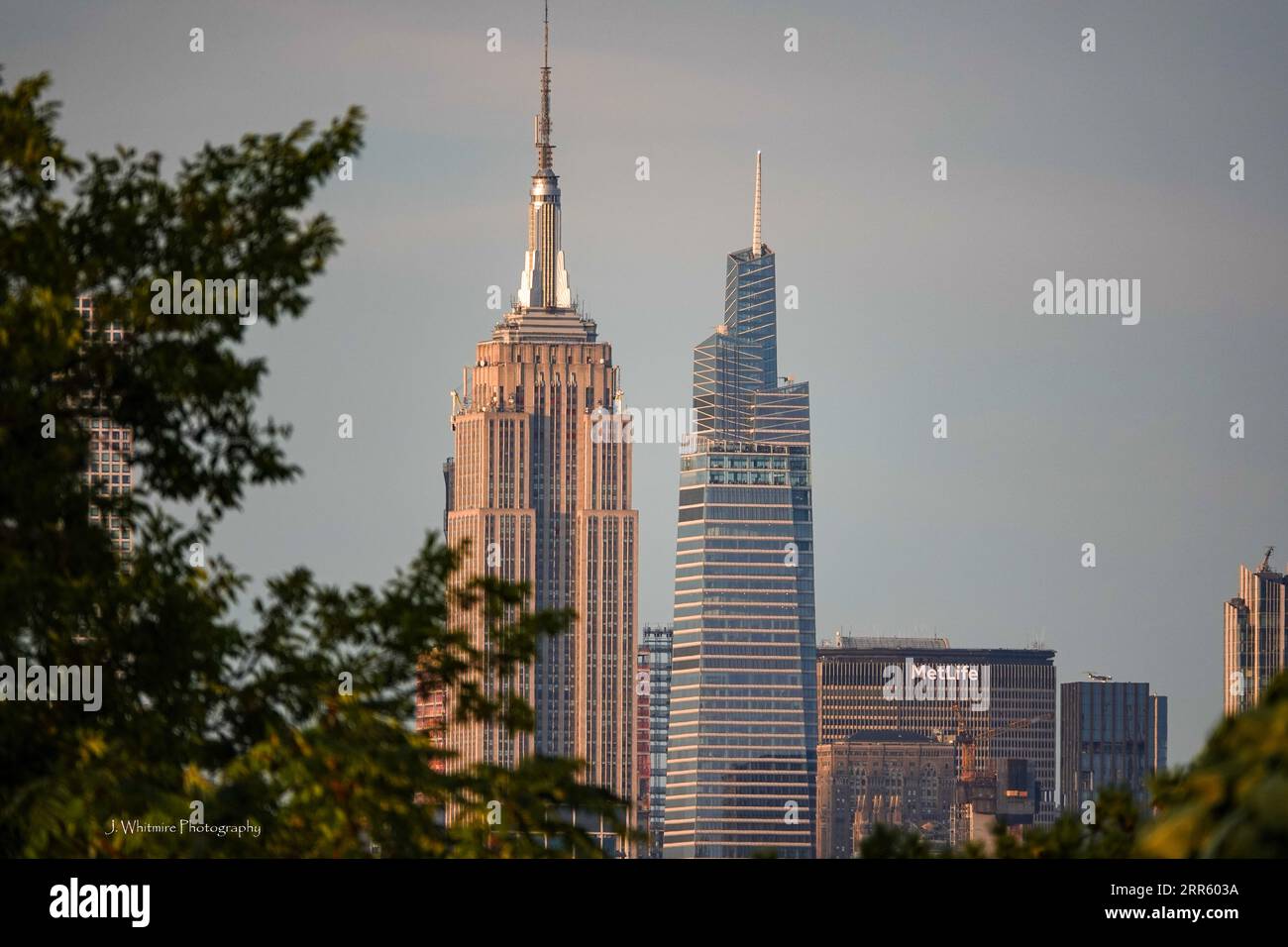The skyline of Manhattan as seen from across the Hudson in New Jersey features such iconic ...
