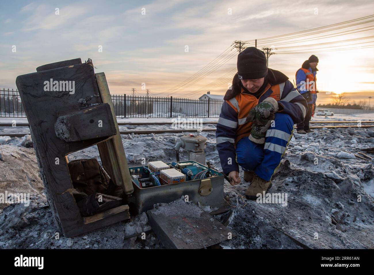 210121 -- MOHE, Jan. 21, 2021 -- Railway repairers maintain the ...