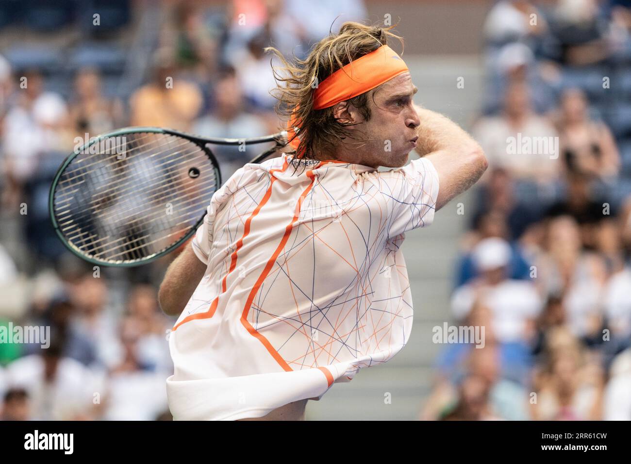 Andrey Rublev returns ball during quarterfinal round against Daniil Medvedev at the US Open ...