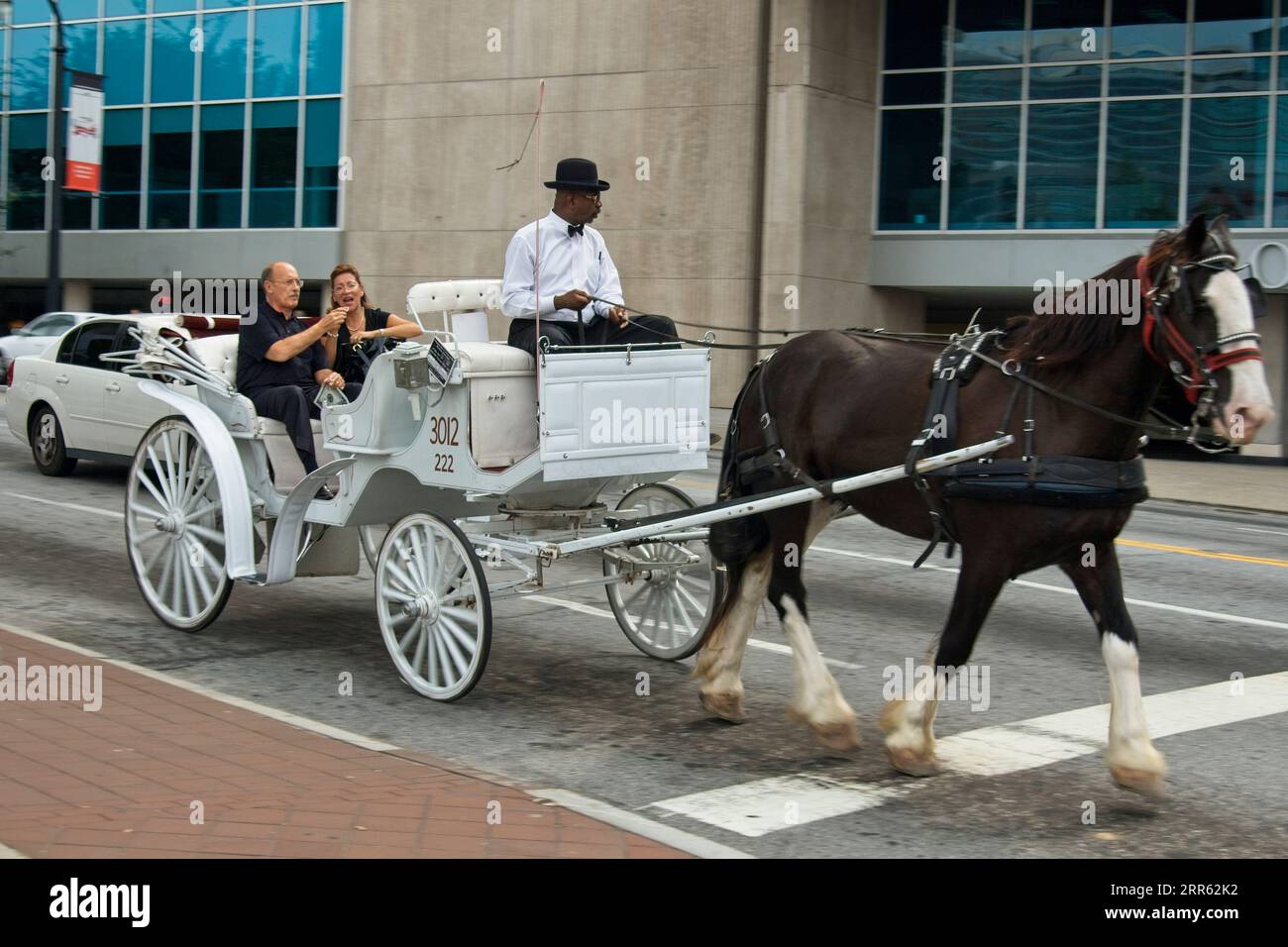 Couple getting a horse and carriage ride in downtown Atlanta Stock ...