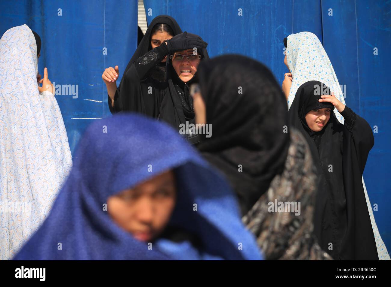 Shahr-e-Ray, Tehran, Iran. 6th Sep, 2023. Iranian veiled women walk ...