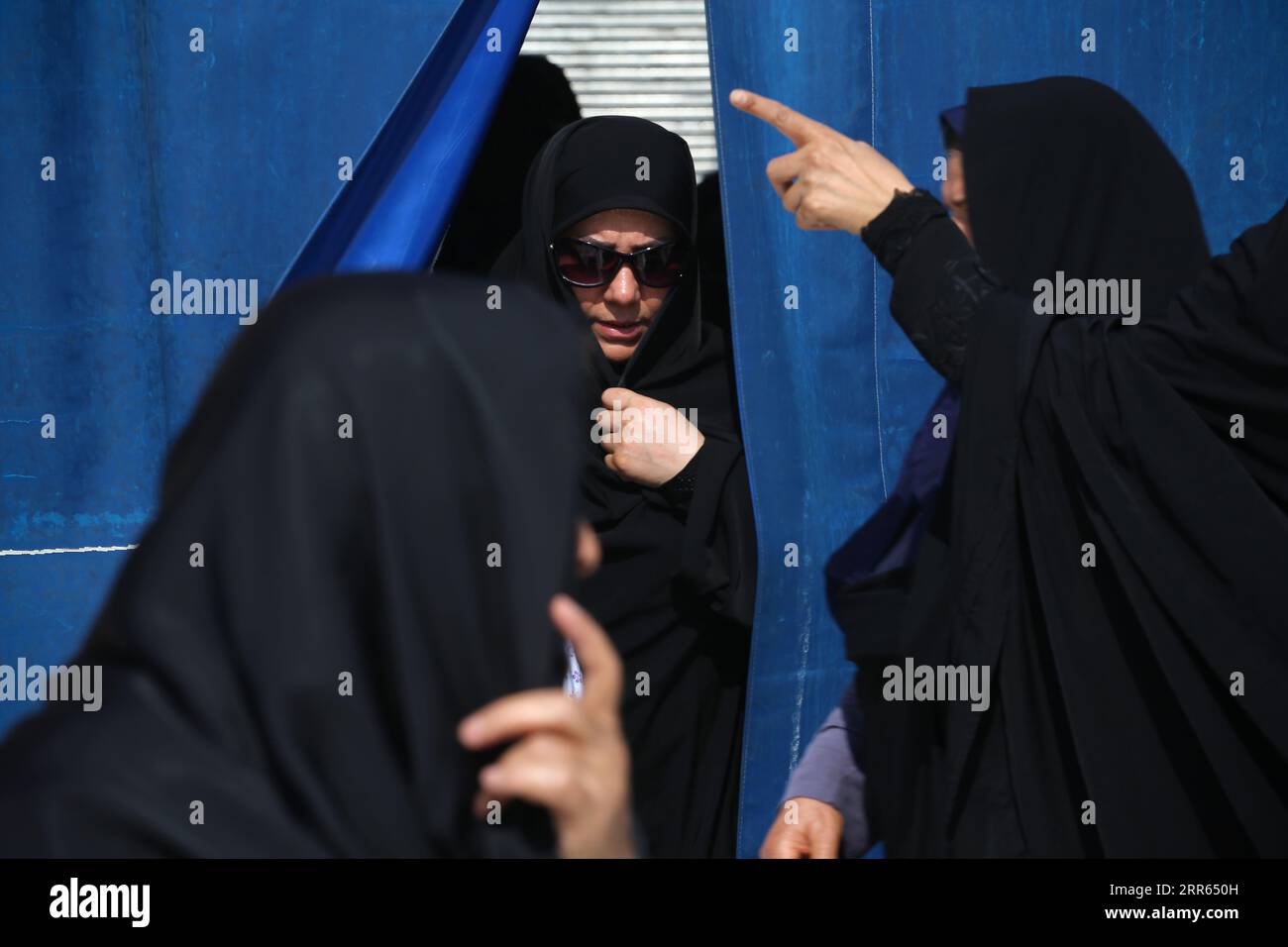 Shahr-e-Ray, Tehran, Iran. 6th Sep, 2023. Iranian veiled women walk ...