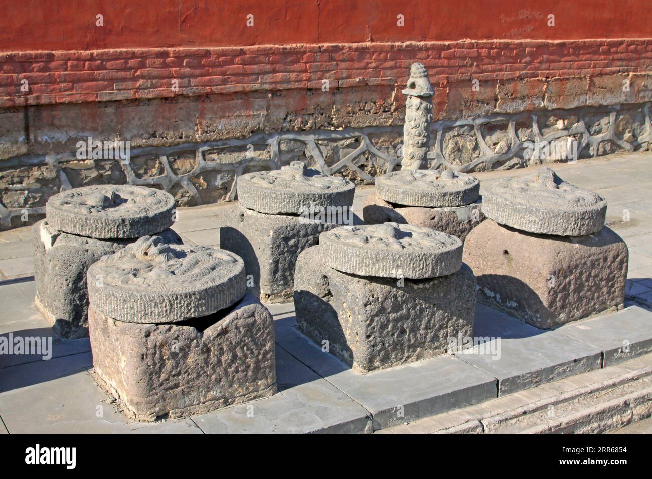 Broken stone implement in a temple, closeup of photo Stock Photo - Alamy