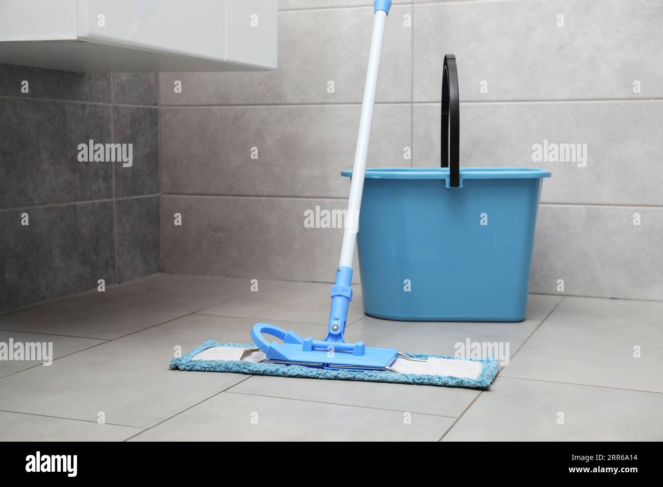 Mopping floor toilet hi-res stock photography and images - Alamy