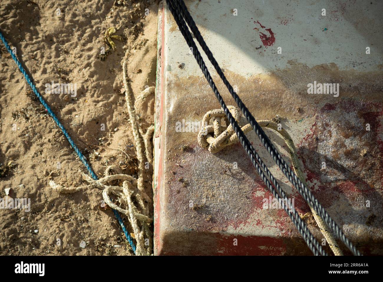 Detail of part of a boat docked on the beach sand. Sea transport Stock ...