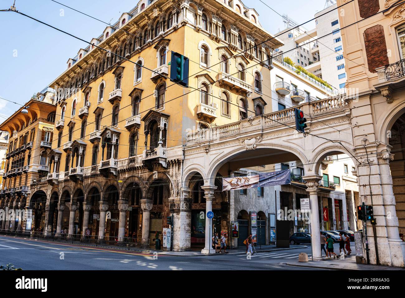 Old buildings connected by a stone bridge in historic Genoa Italy Stock ...