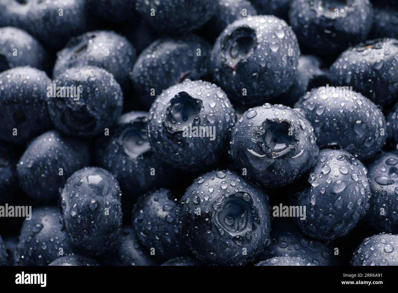 Wet fresh blueberries as background, closeup view Stock Photo - Alamy