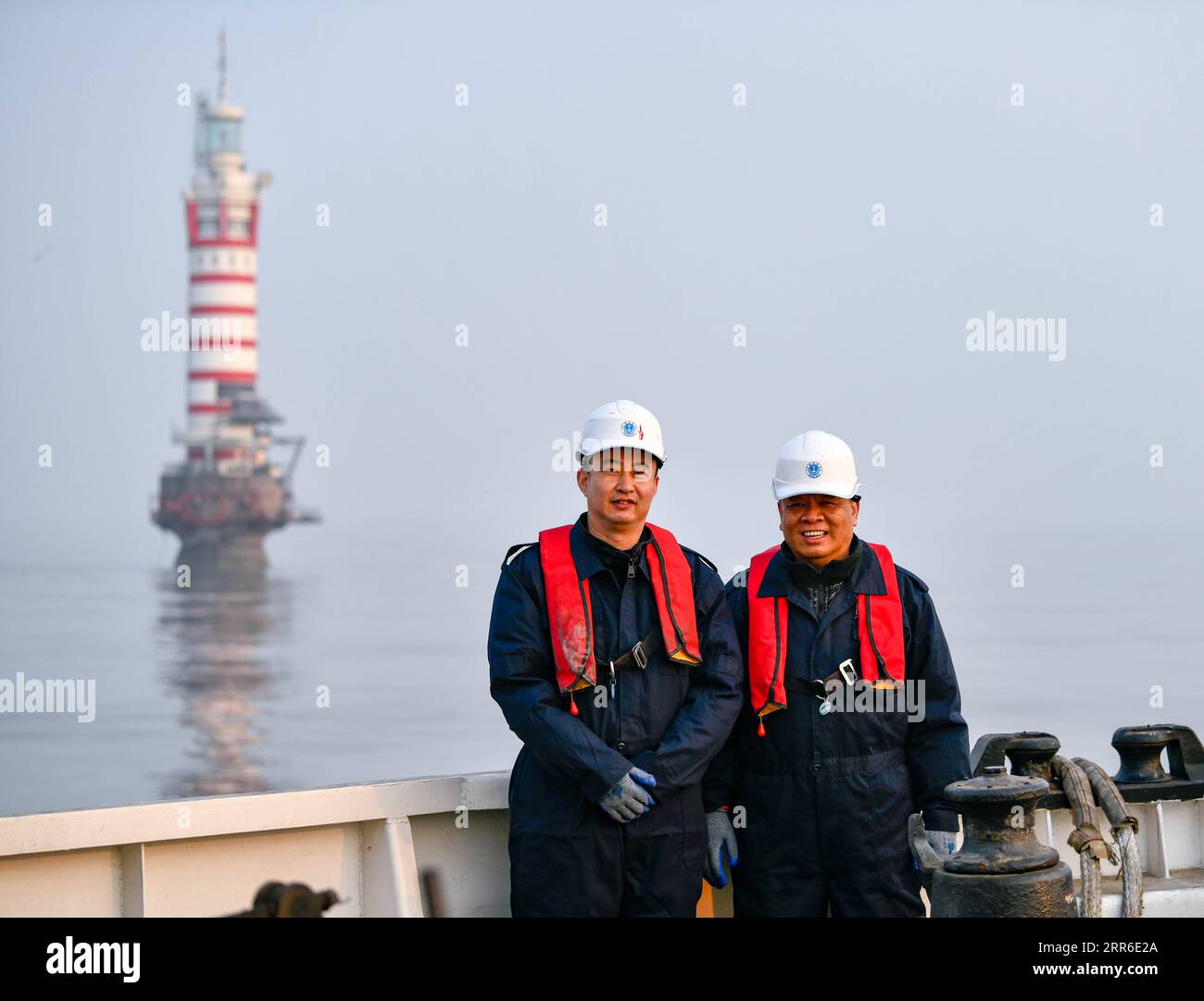 210209 -- TIANJIN, Feb. 9, 2021 -- Li Hongqi R and his colleague Liu ...