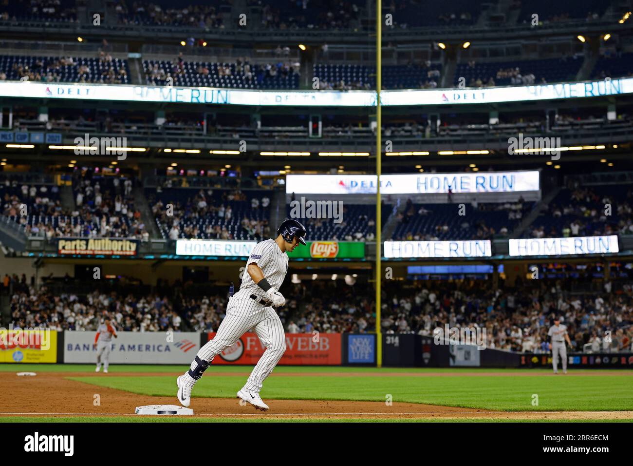 New York Yankees' Jasson Dominguez rounds third base after hitting a ...
