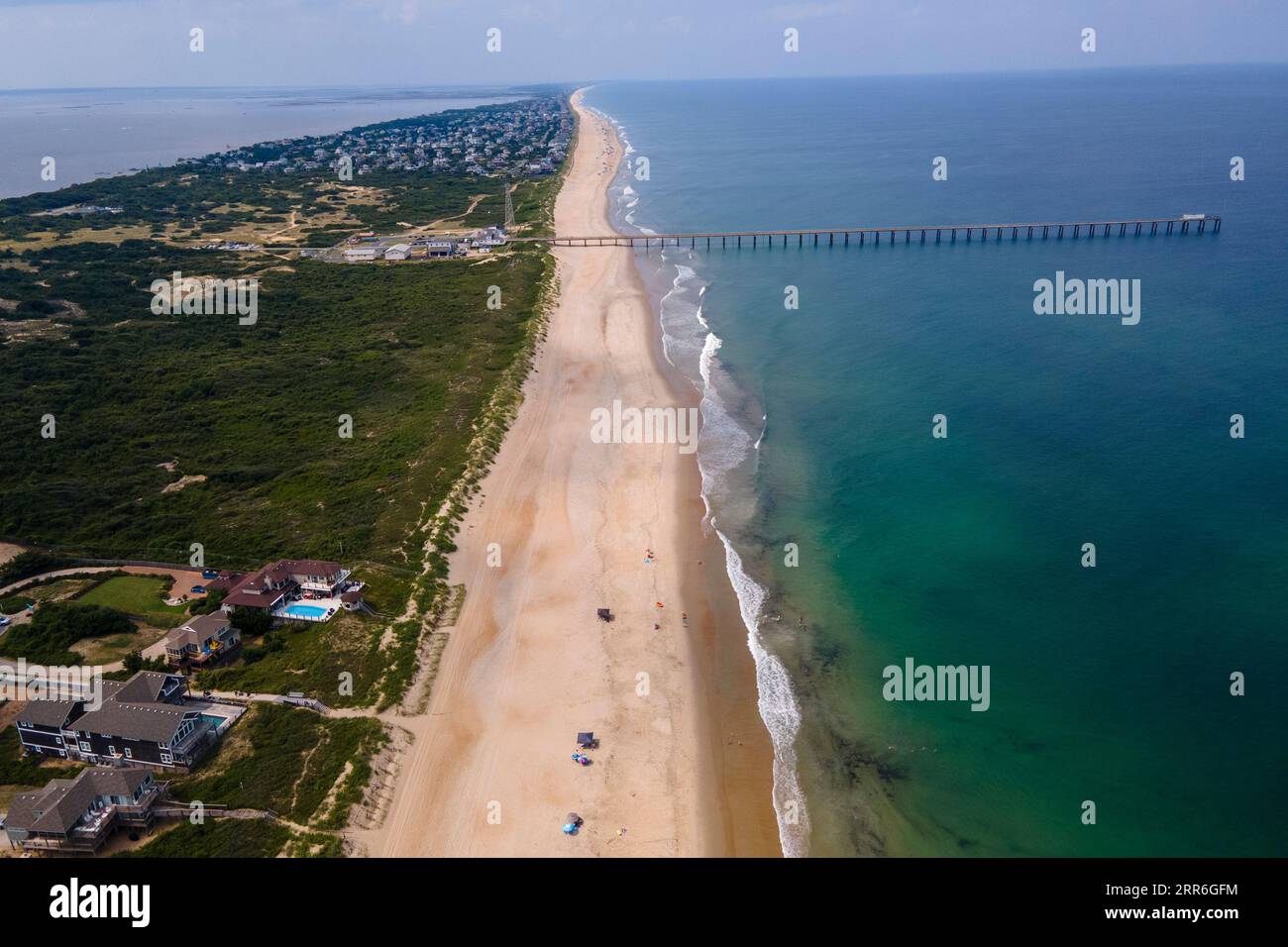 The Atlantic Ocean, beach and houses are at Duck, Outer Banks, North ...