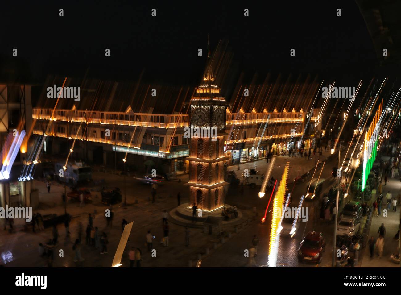 Srinagar Kashmir, India. 06th Sep, 2023. People walk near the colorful ...