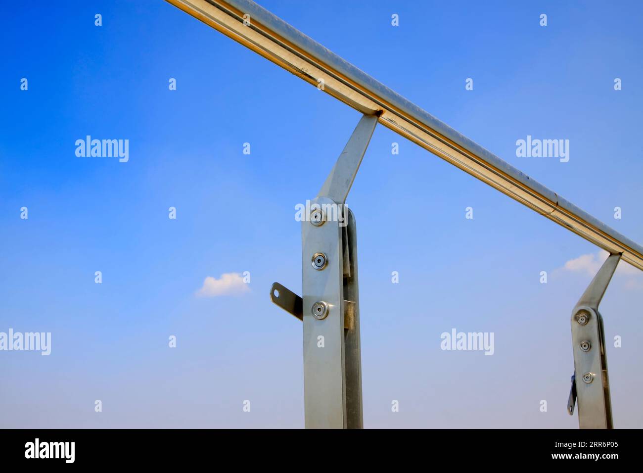 Stainless steel rail, closeup of photo Stock Photo - Alamy
