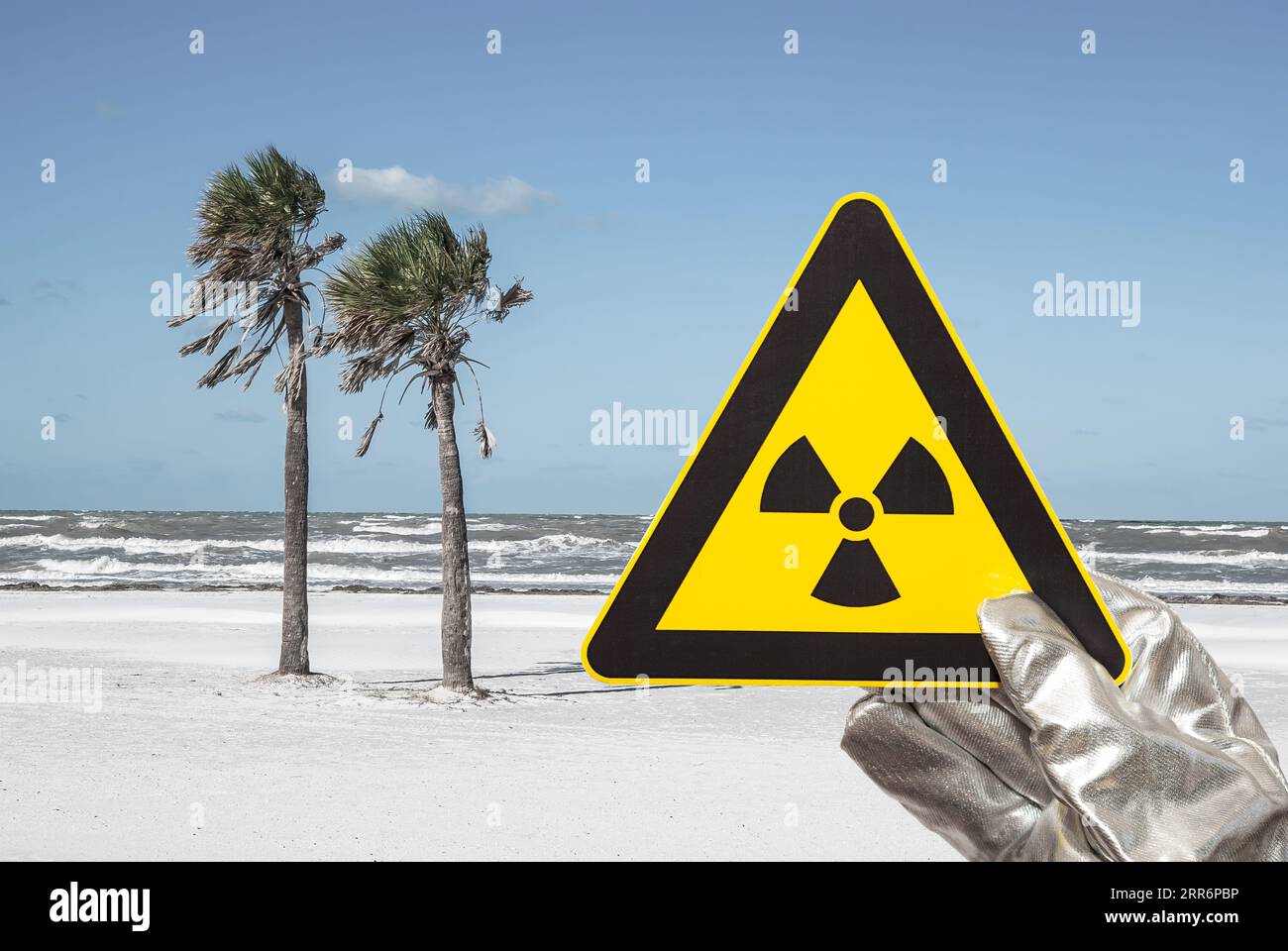 nuclear radiation warning sign in front of a beach Stock Photo - Alamy
