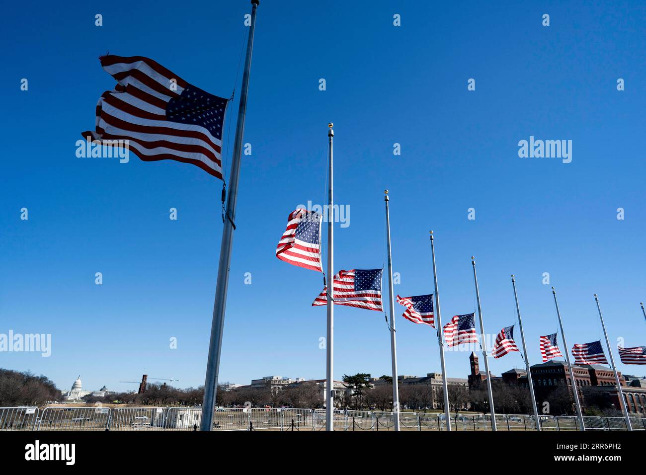 210225 -- WASHINGTON, D.C., Feb. 25, 2021 -- U.S. national flags fly at ...