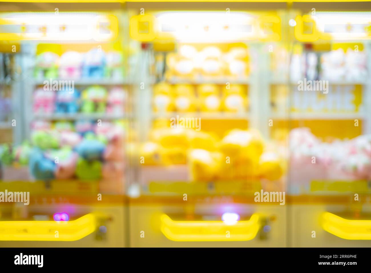 out of focus crane game machines at horizontal composition as ...