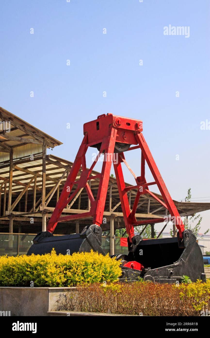 Metal grab bucket Stock Photo - Alamy