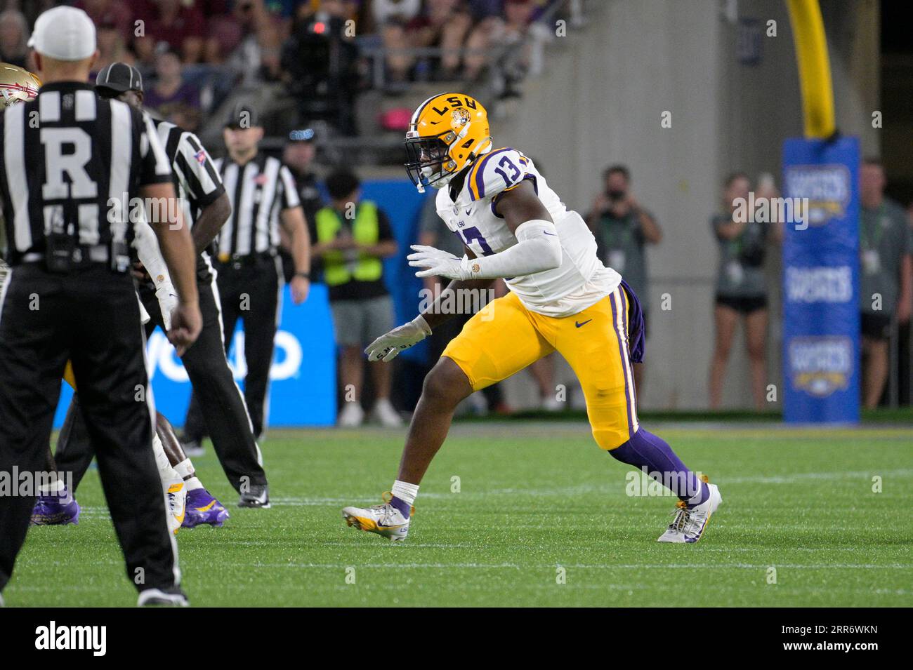 LSU defensive end Bradyn Swinson (13) follows a play during the second ...