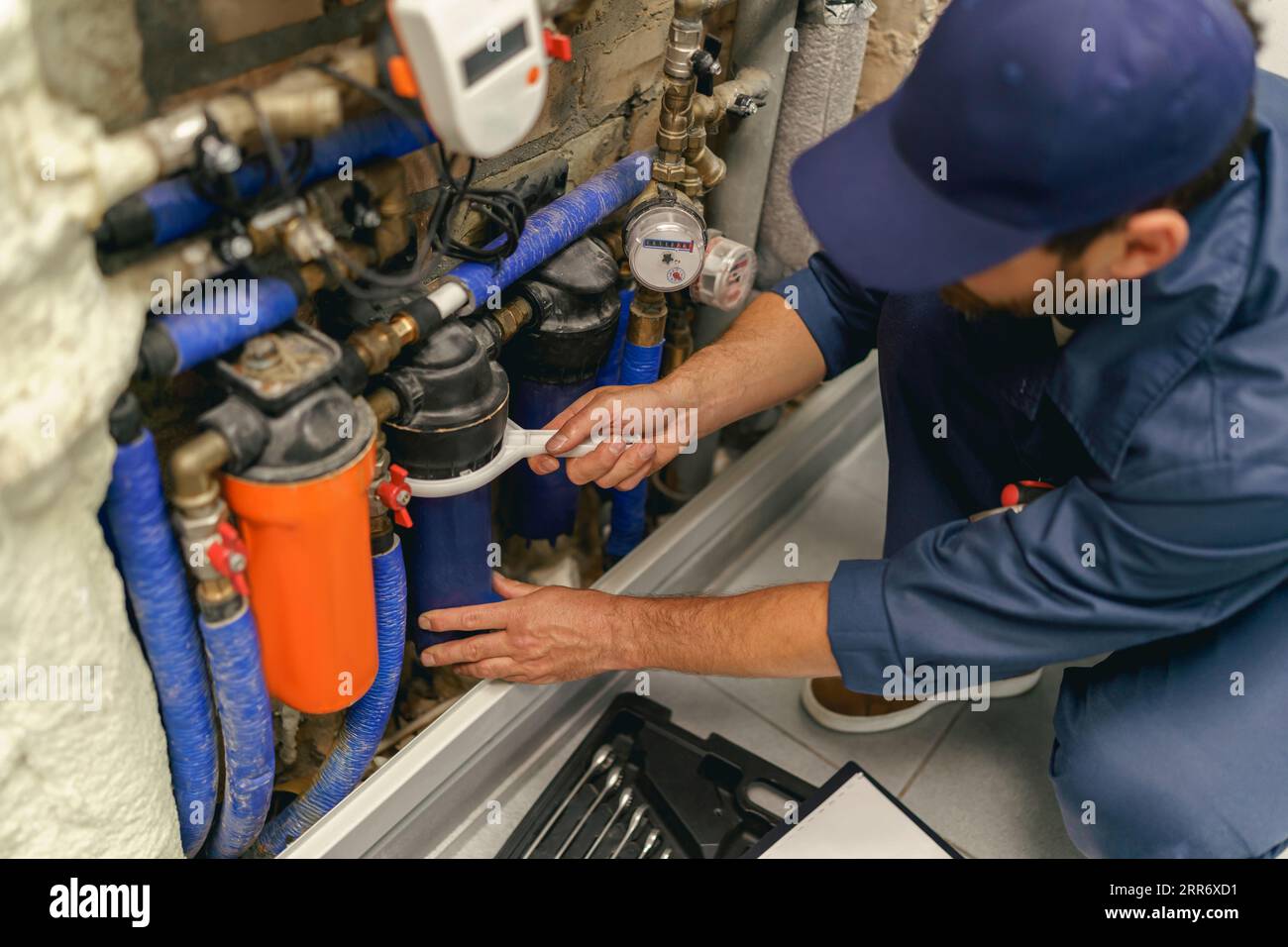 Professional uses special tool repair hi-res stock photography and ...