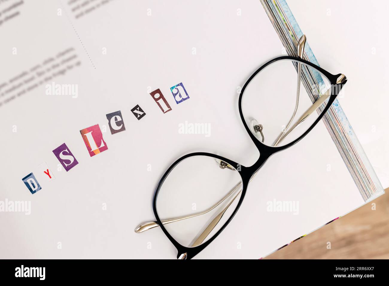 Dyslexia disorder concept, word spelled in colorful paper cut letters ...