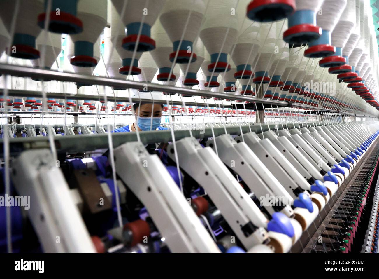 BINZHOU, CHINA - SEPTEMBER 5, 2023 - A worker works at a workshop of a textile and garment ...