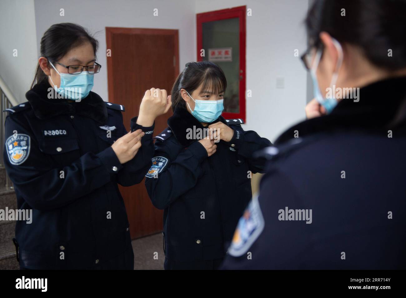 210307 -- BEIJING, March 7, 2021 -- Zhang Anqi L and Liu Xuwen, members of the female police ...