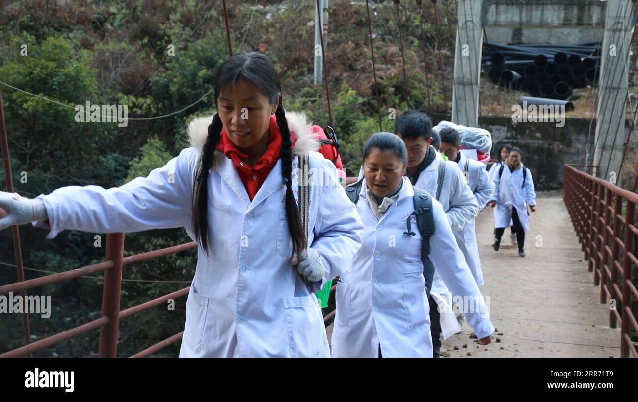 210308 -- GUANGZHOU, March 8, 2021 -- Guan Yanping front and her ...