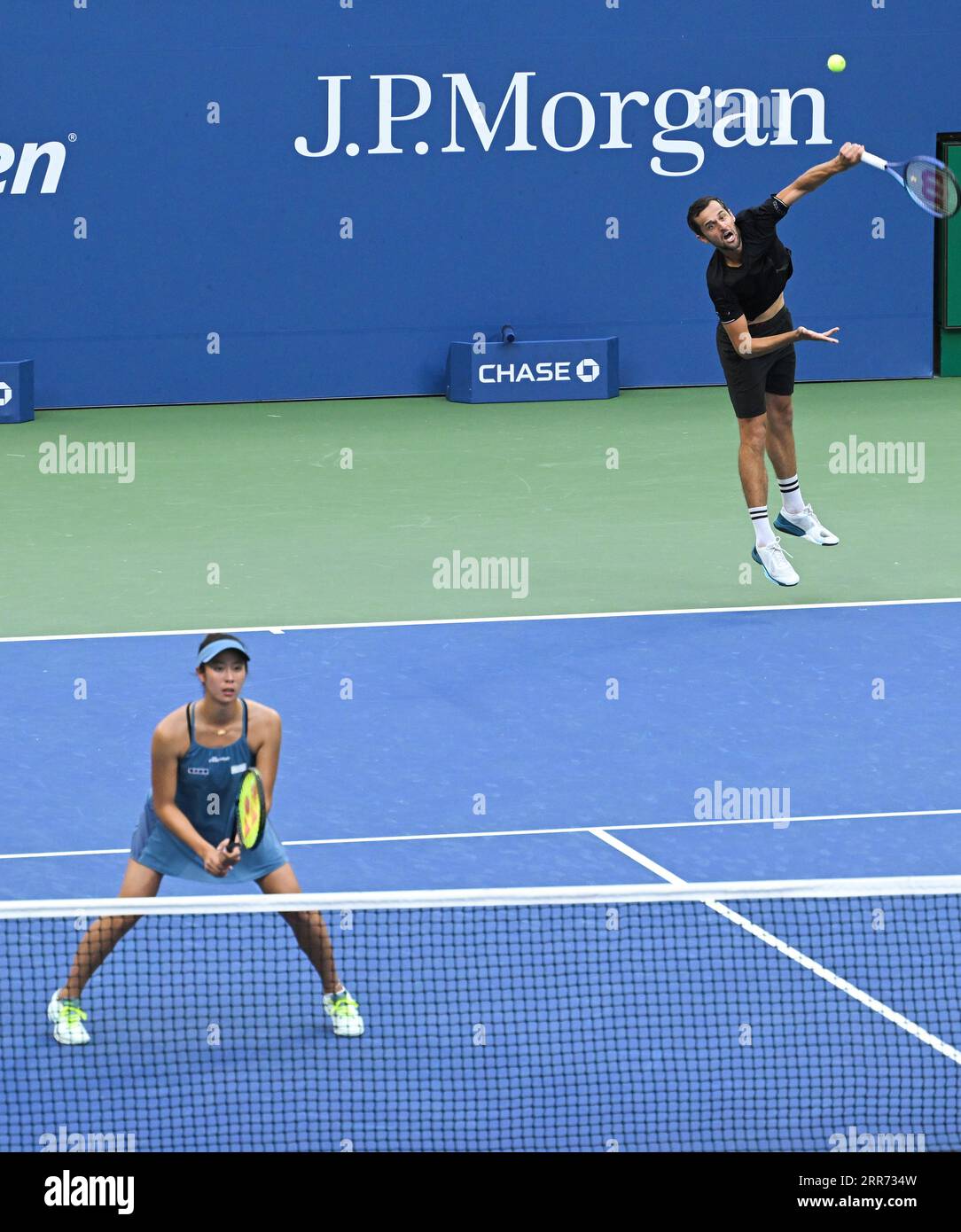 Mate Pavic and Ena Shibahara in action during a mixed doubles semifinal ...