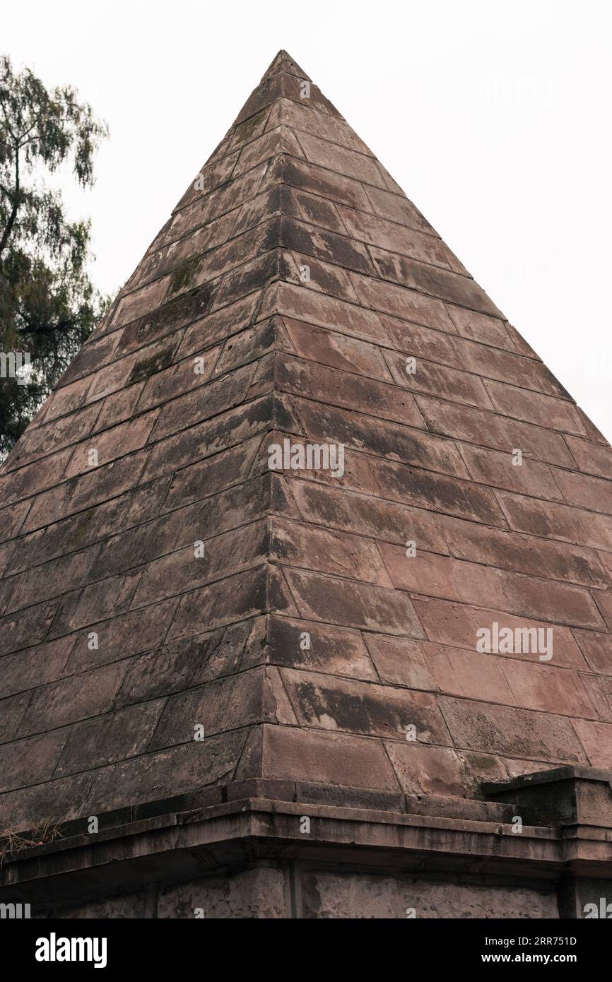 stone structure pyramid in an outdoor park with natural light in ...