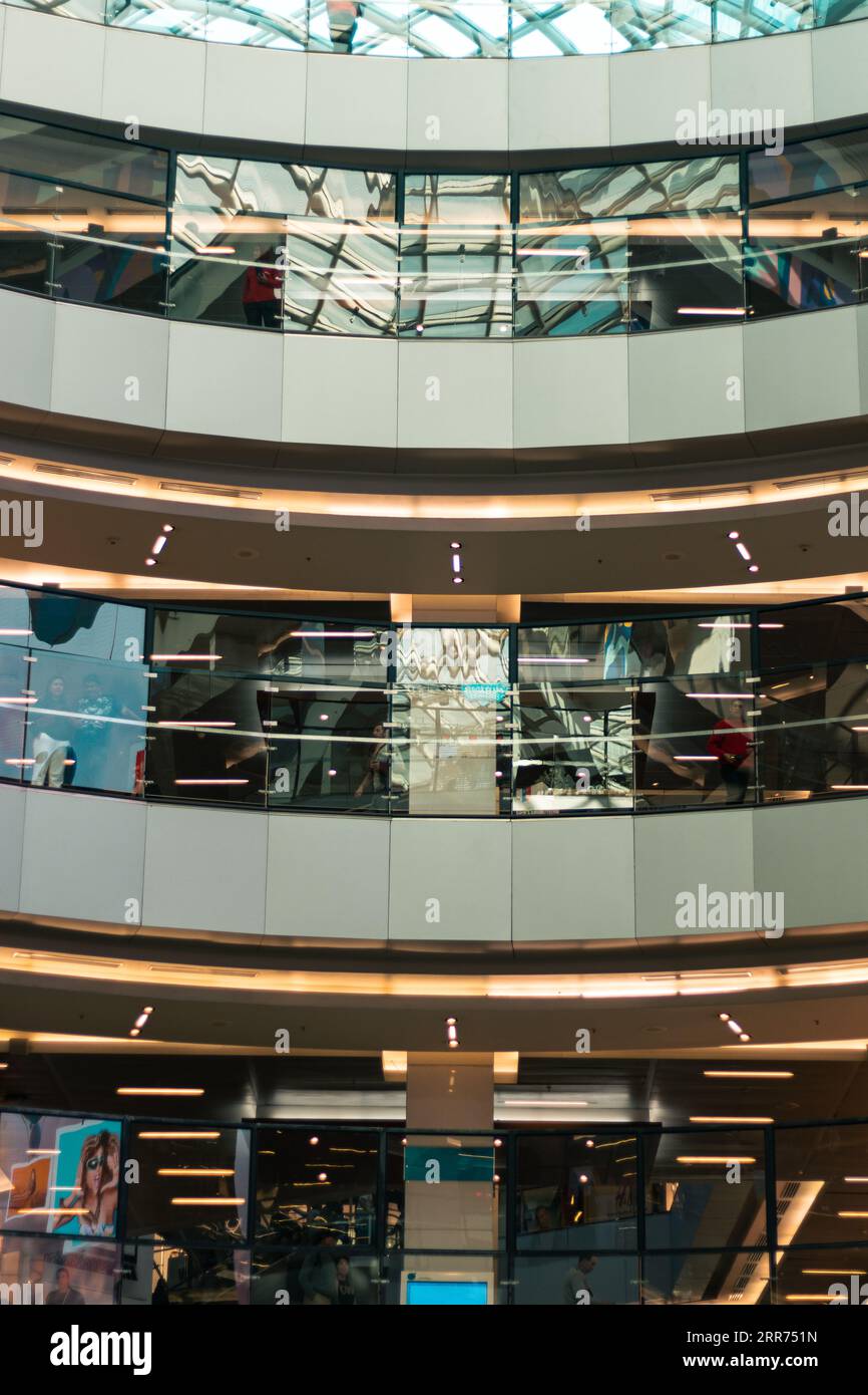 vertical view of floors in building with windows and transparency with ...