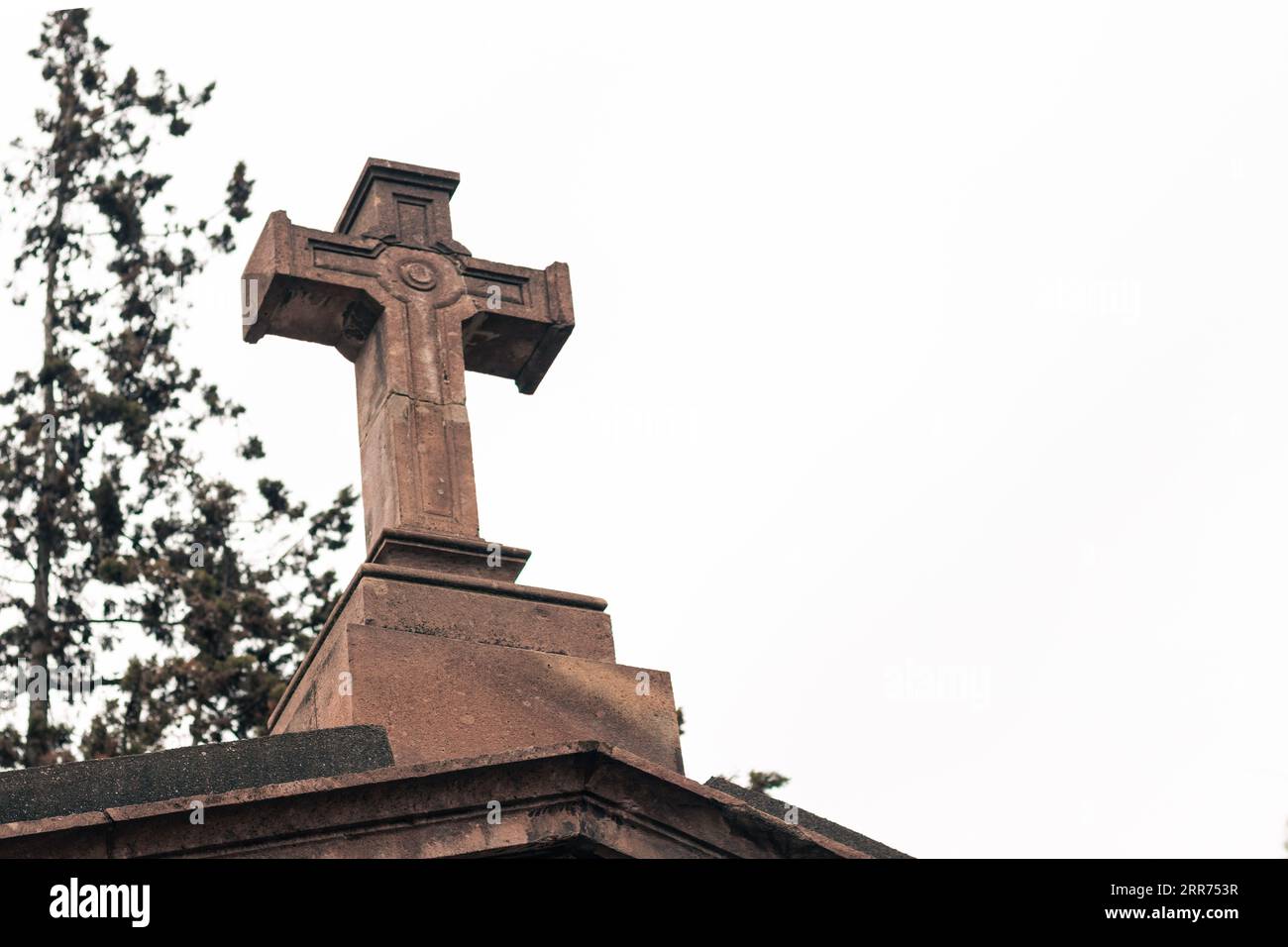 ancient christian cross on a temple grave in an outdoor cemetery Stock ...