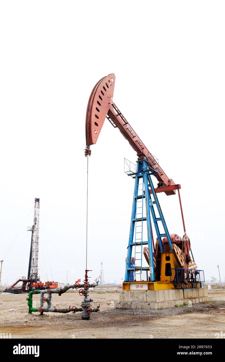 Crank balanced beam pumping unit, closeup of photo Stock Photo - Alamy