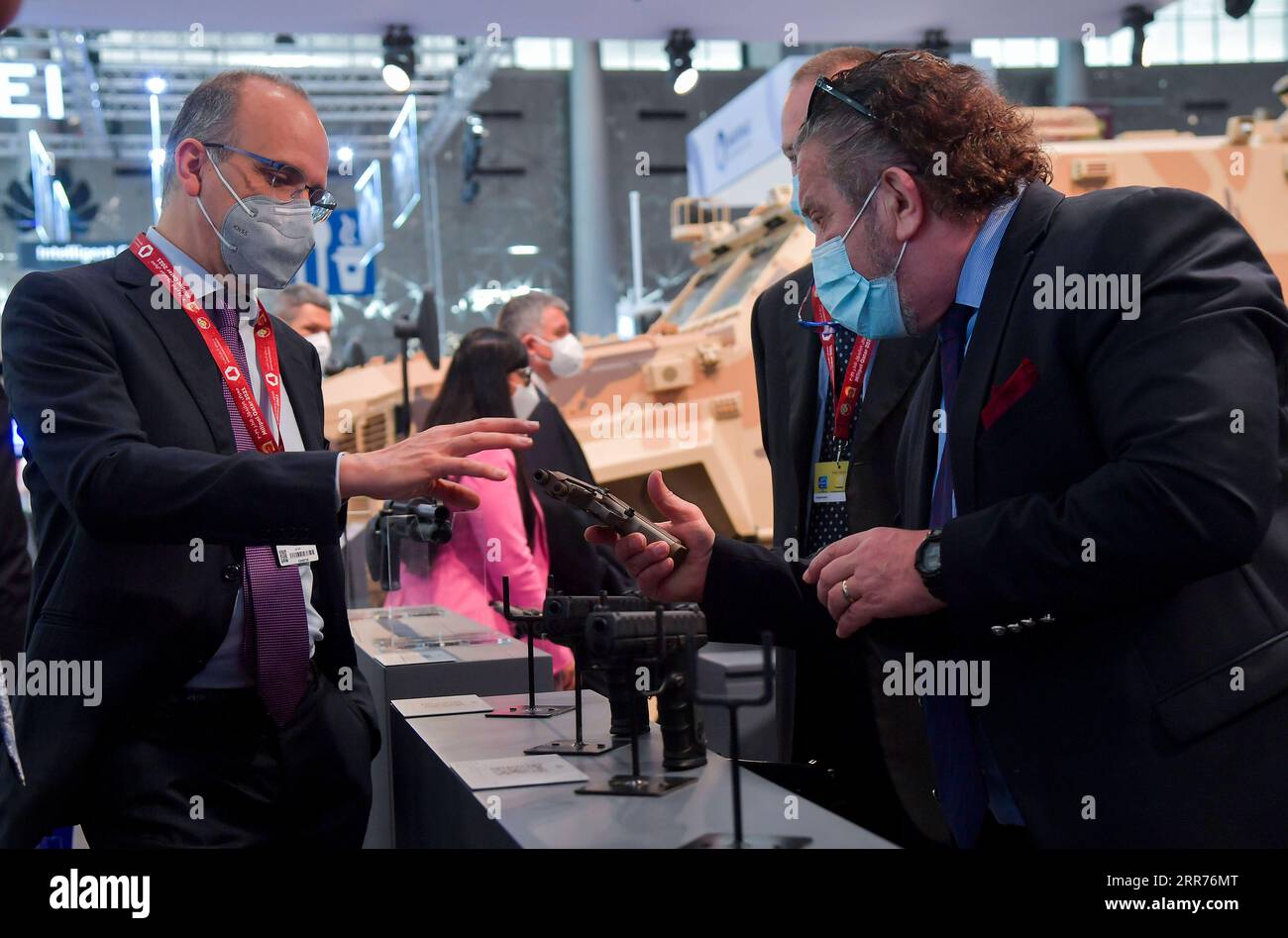 210315 -- DOHA, March 15, 2021 -- Visitors look at exhibits after the ...