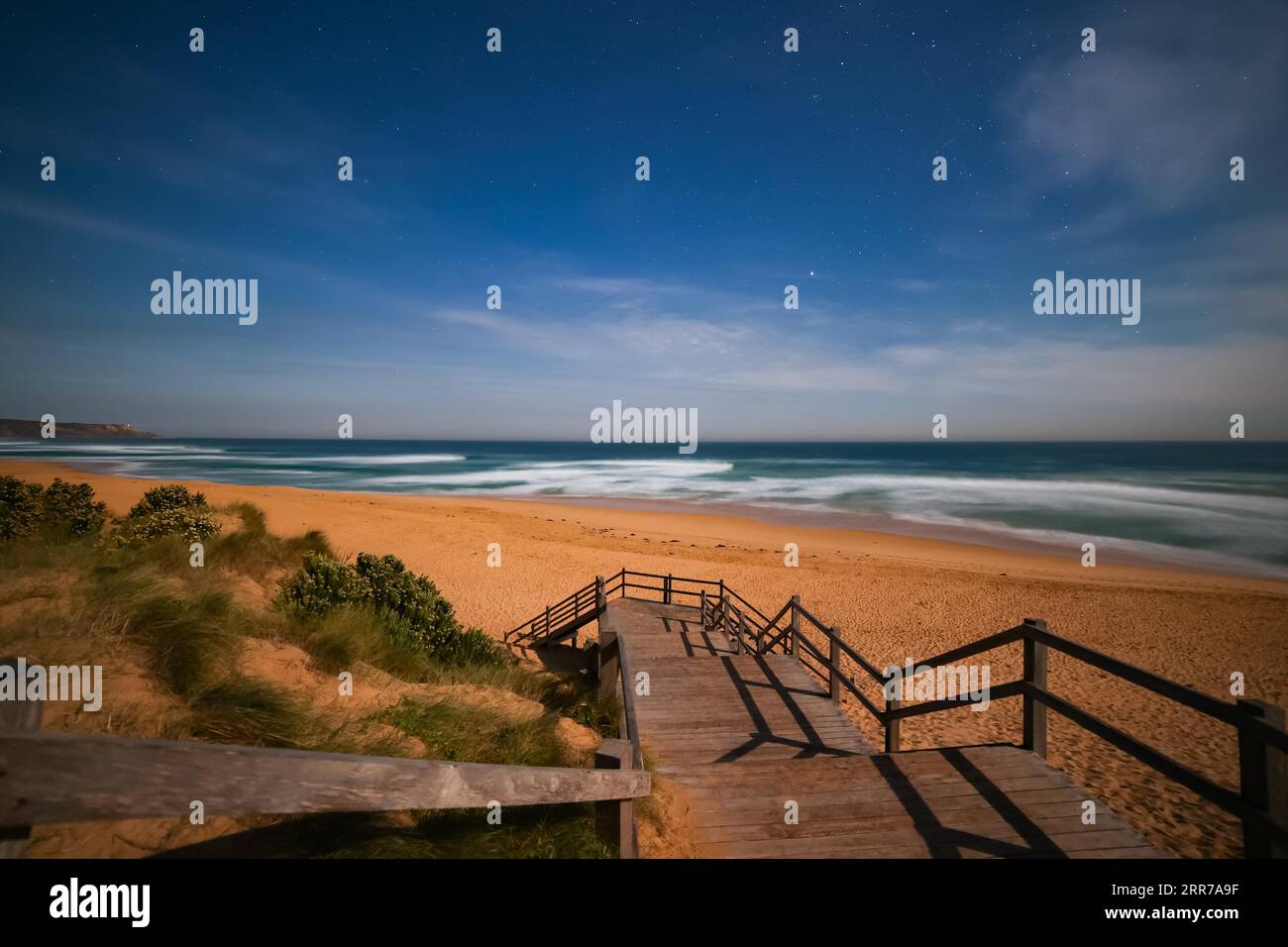 The idyllic Number Sixteen Beach and moon rising at sunset in Rye ...