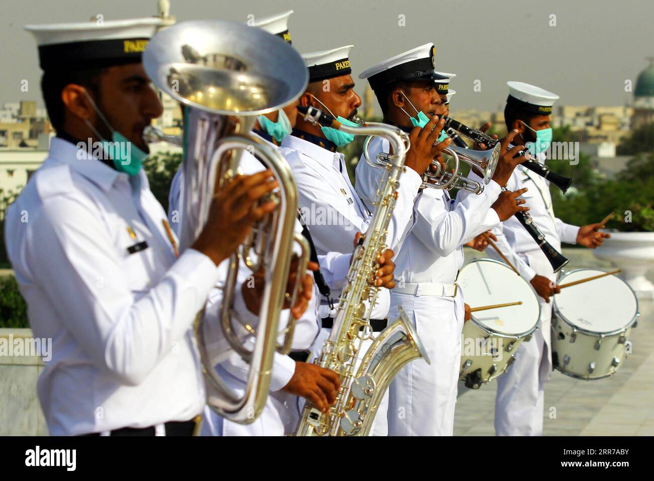 210323 -- KARACHI, March 23, 2021 -- Pakistani Navy Band members ...