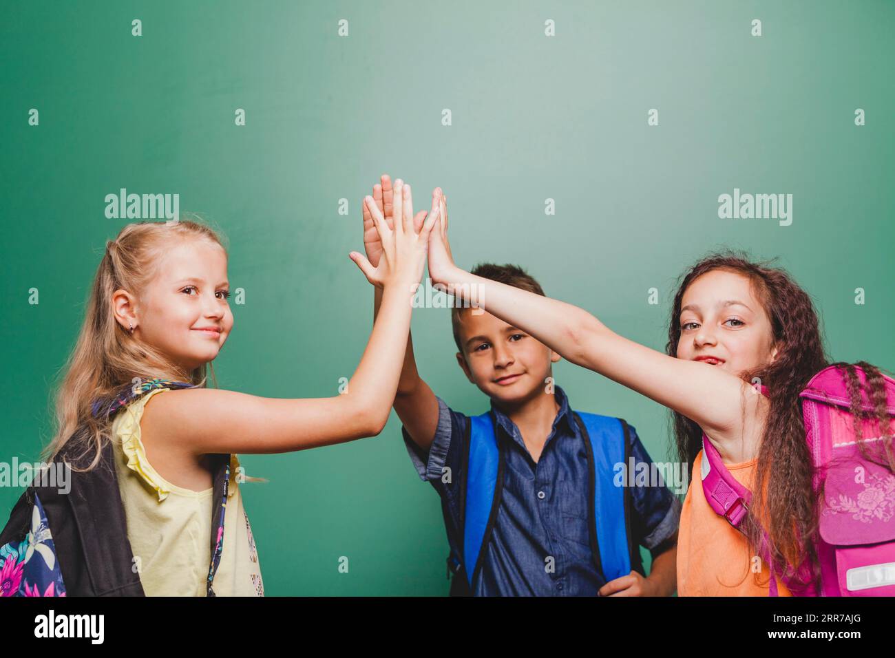 Children high five hi-res stock photography and images - Alamy