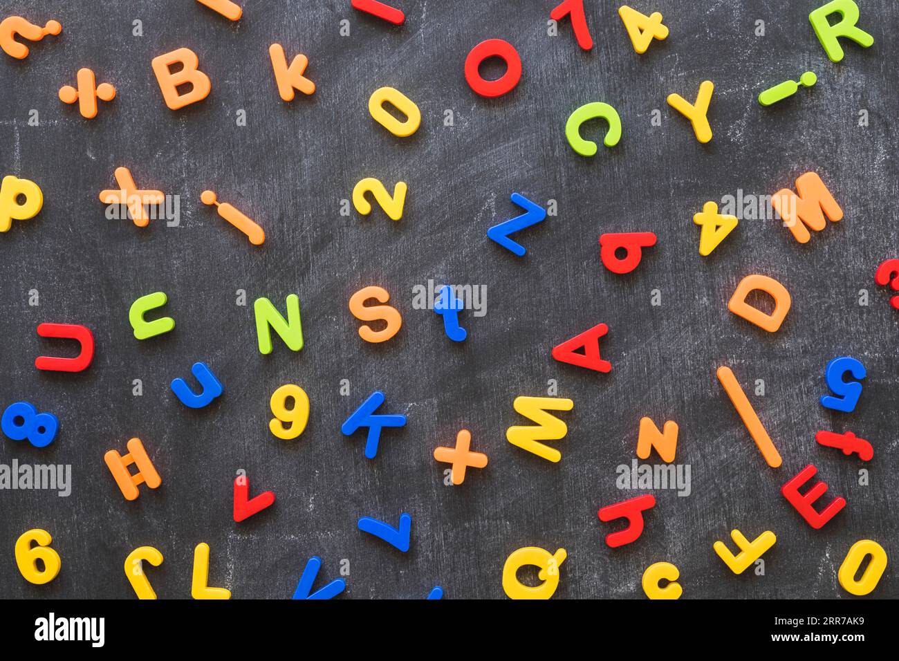 Blackboard with many messy organized characters Stock Photo - Alamy