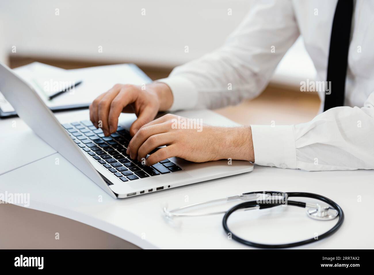 Close up hands typing keyboard Stock Photo - Alamy