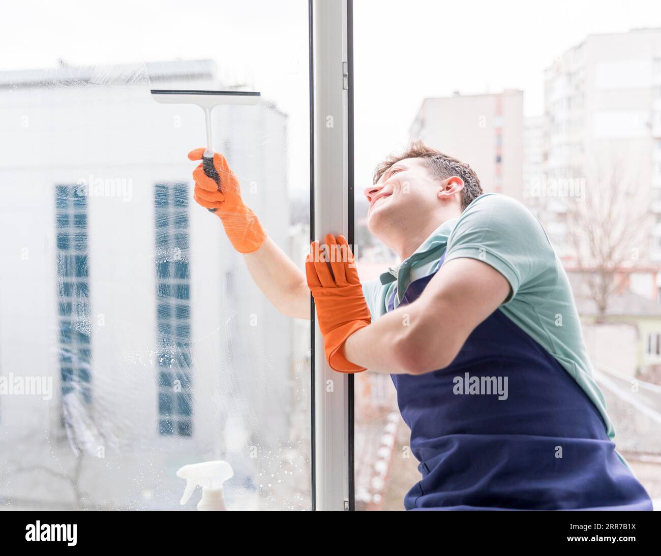 Man cleaning windows Stock Photo - Alamy
