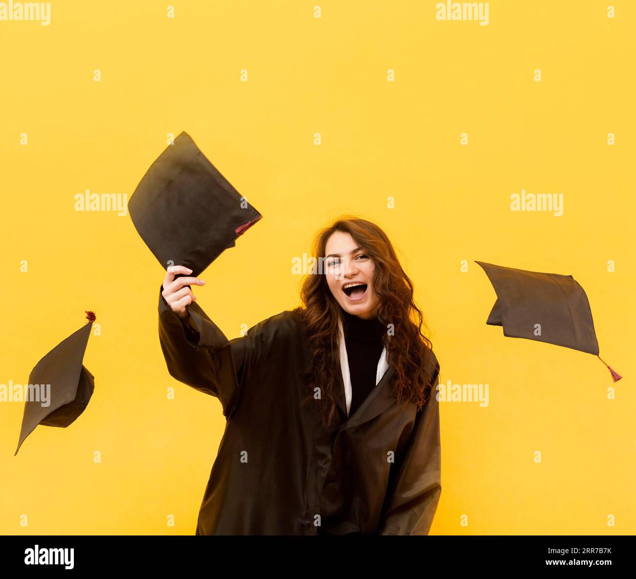 Medium shot girl with toga hat Stock Photo - Alamy