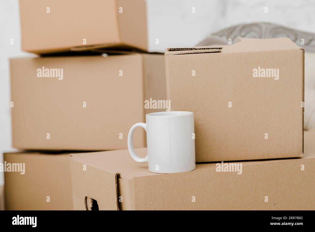 Mug carton boxes Stock Photo - Alamy